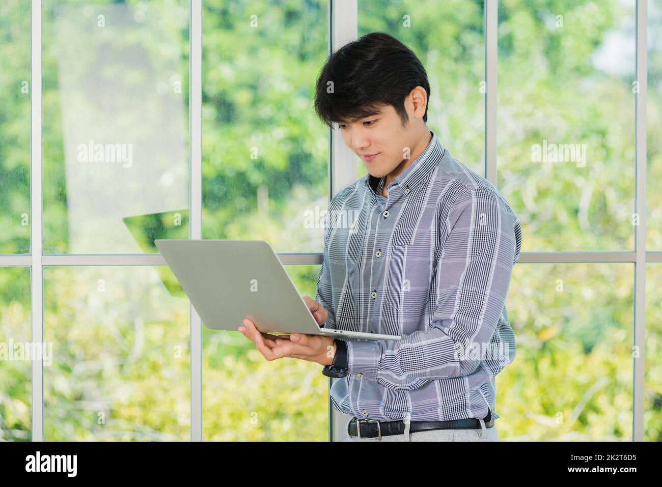 Happy businessman man stand near workplace hi-res stock photography and ...