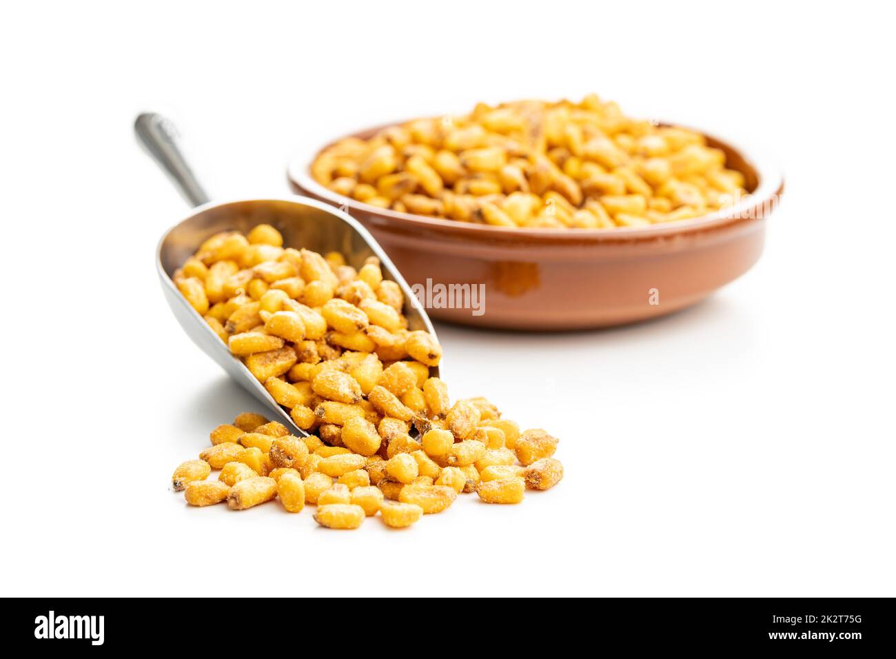 Roasted salted corn snack in scoop isolated on white background Stock ...