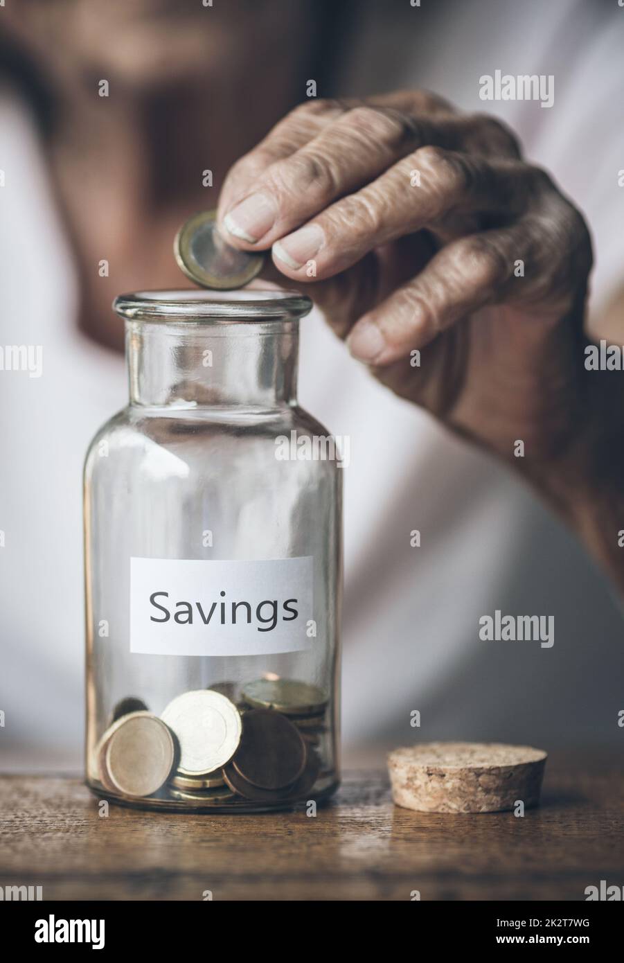 Elderly retired woman and her savings Stock Photo - Alamy