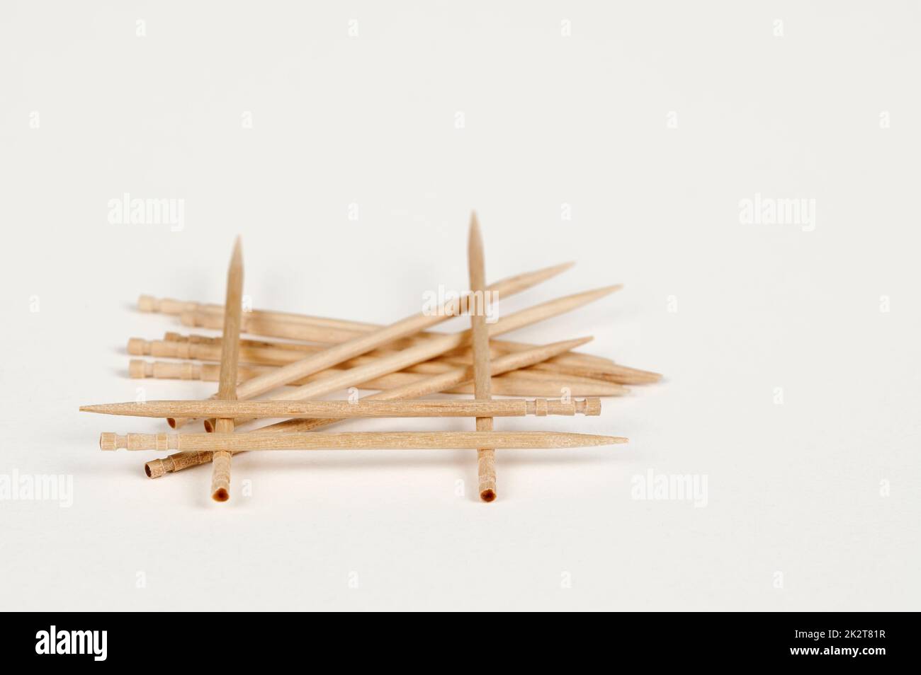 Wooden toothpicks on white Stock Photo - Alamy