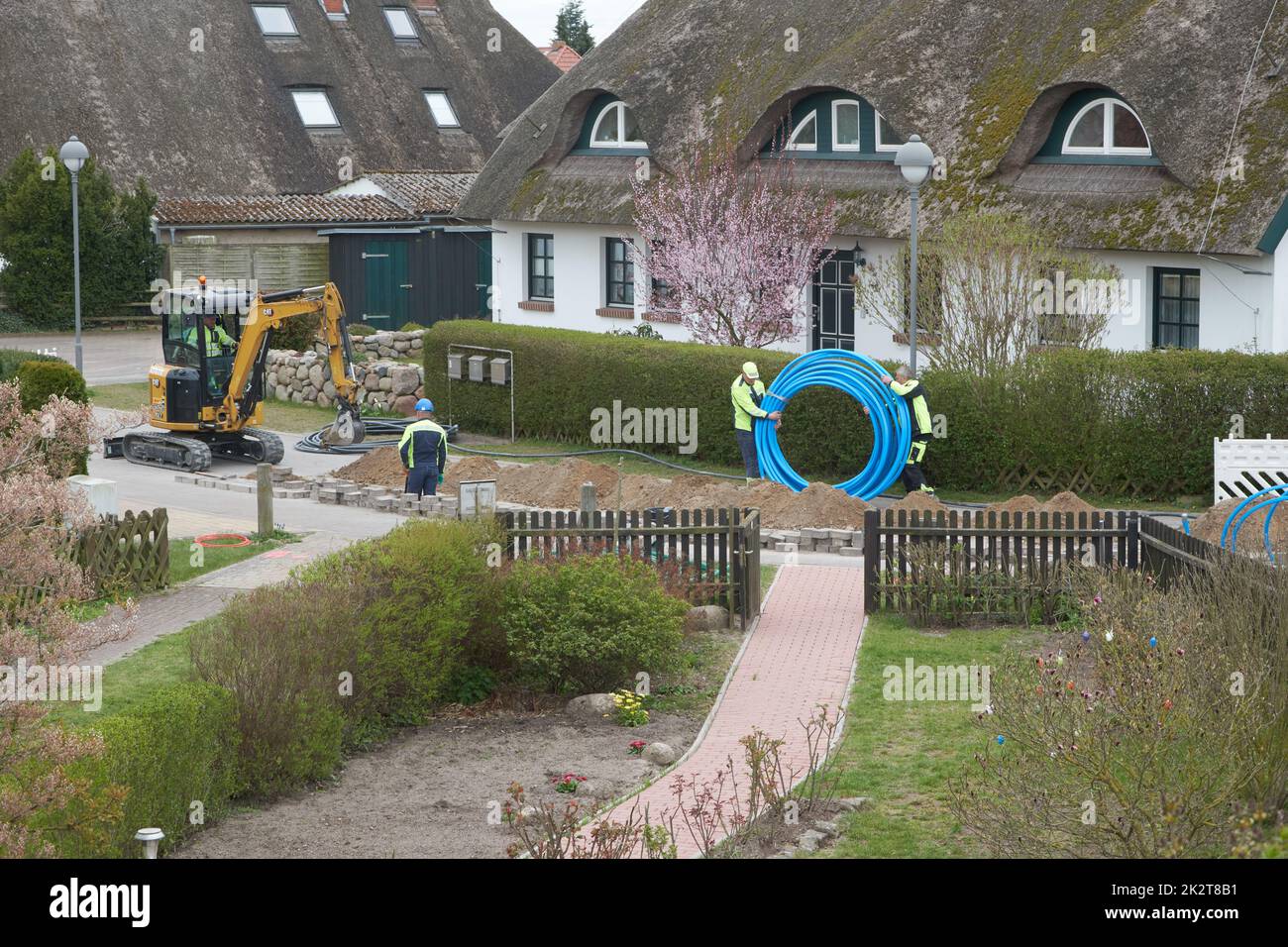 Construction site laying of fiber optic cable hi-res stock photography ...