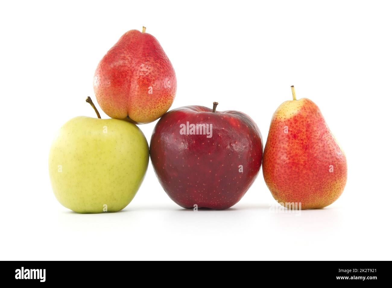 Whole ripe apple and pear isolated on white Stock Photo - Alamy