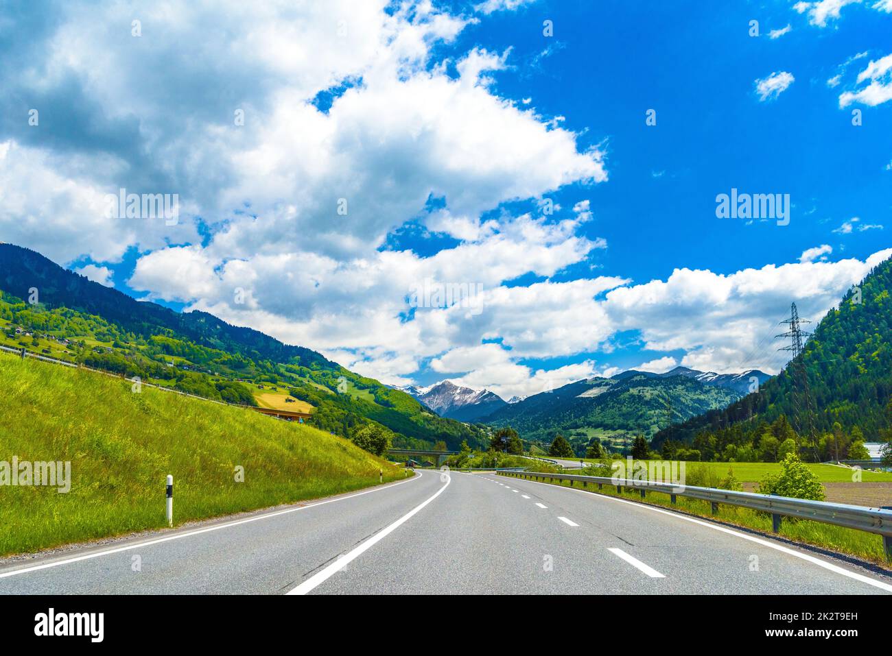 Road among Alps mountains, Klosters-Serneus, Davos, Graubuenden Stock ...