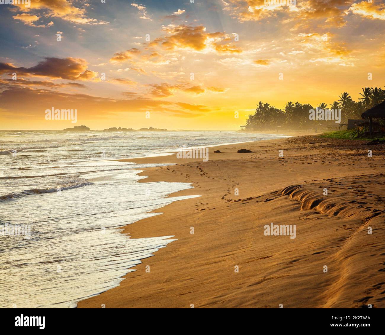 Ocean sunset at sea beach Stock Photo - Alamy
