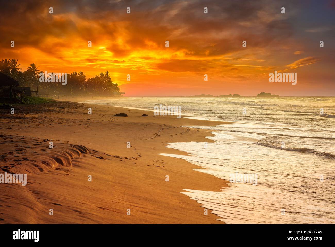 Ocean sunset at sea beach Stock Photo - Alamy