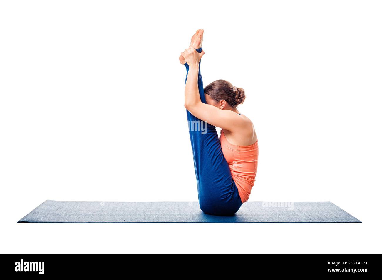 Woman doing Ashtanga Vinyasa yoga asana Urdhva mukha paschimotta Stock ...