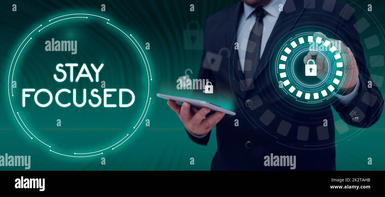 Writing displaying text Stay Focused. Concept meaning Be attentive Concentrate Prioritize the ...