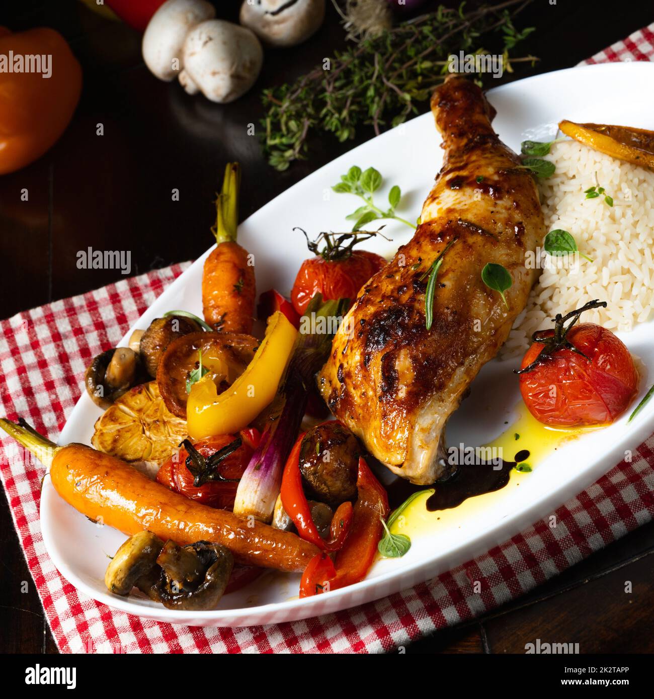 Rustic fried chicken legs with assorted vegetables and rice Stock Photo ...