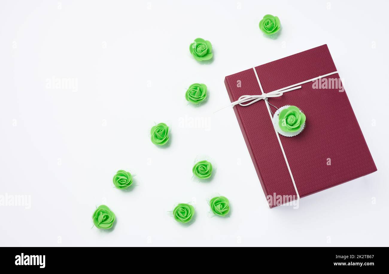 Red cardboard gift box with lid on white background Stock Photo - Alamy