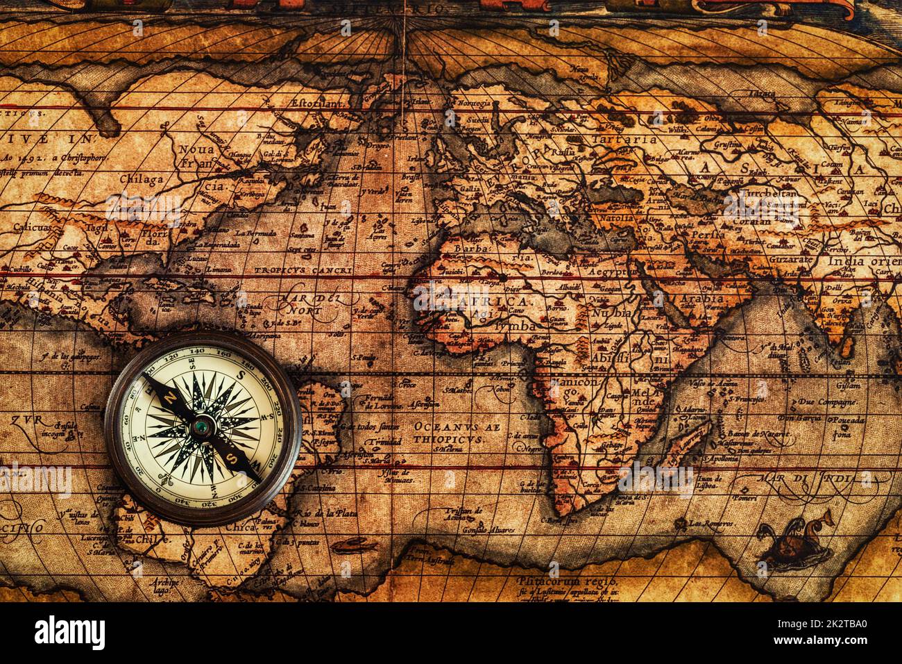 Old vintage compass on ancient map Stock Photo - Alamy