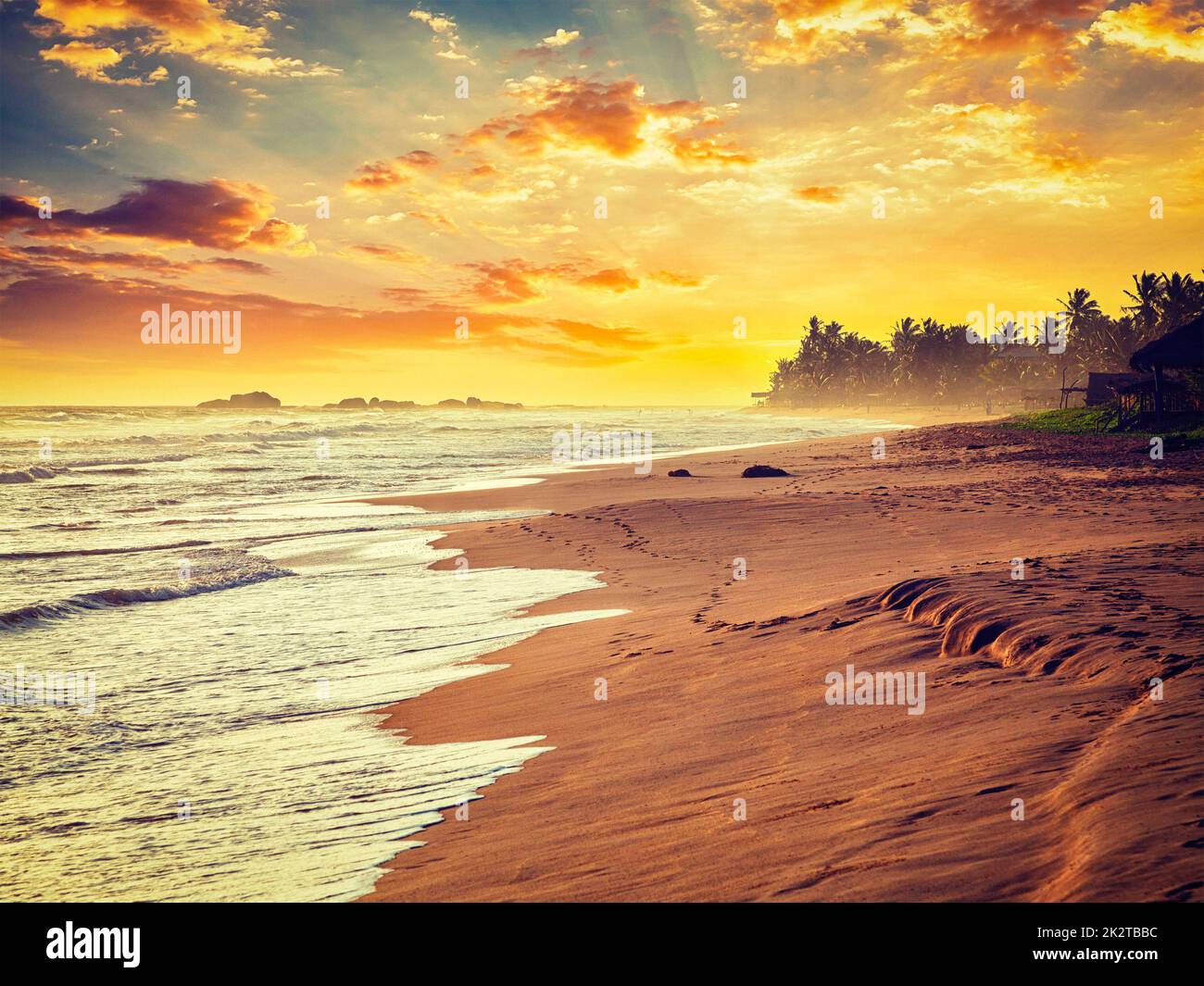 Ocean beach sunset Stock Photo - Alamy