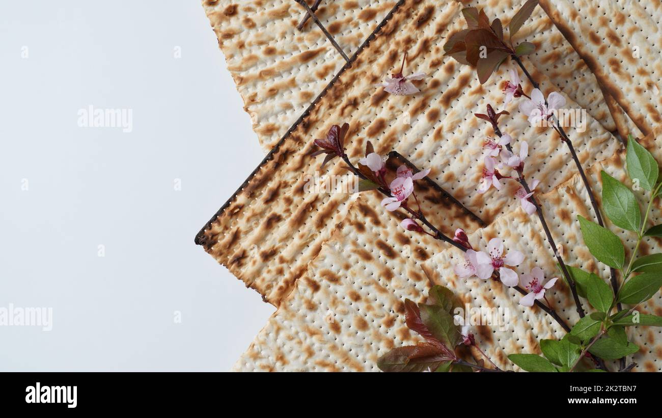 Table served for Passover (Pesach) indoors, with matzah bread as ...