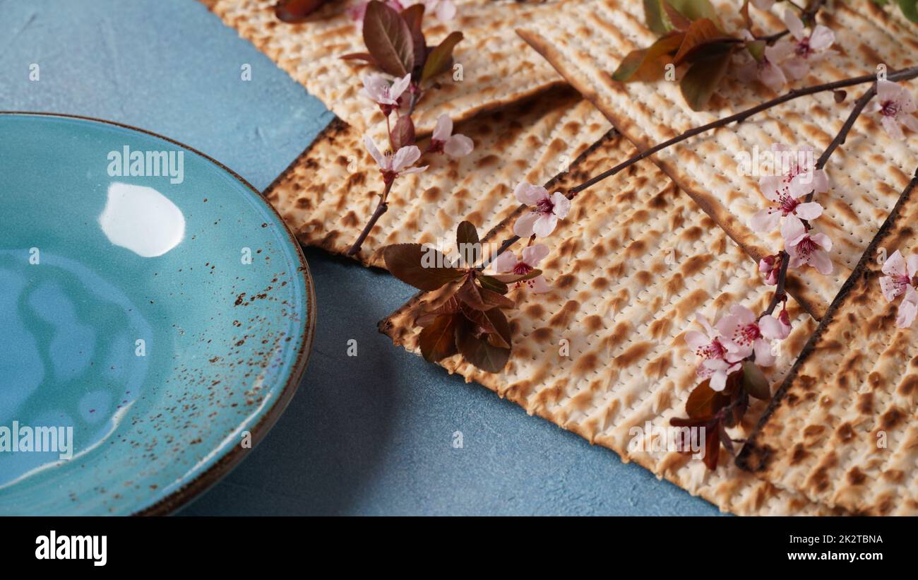 Table served for Passover (Pesach) indoors, with matzah bread as ...