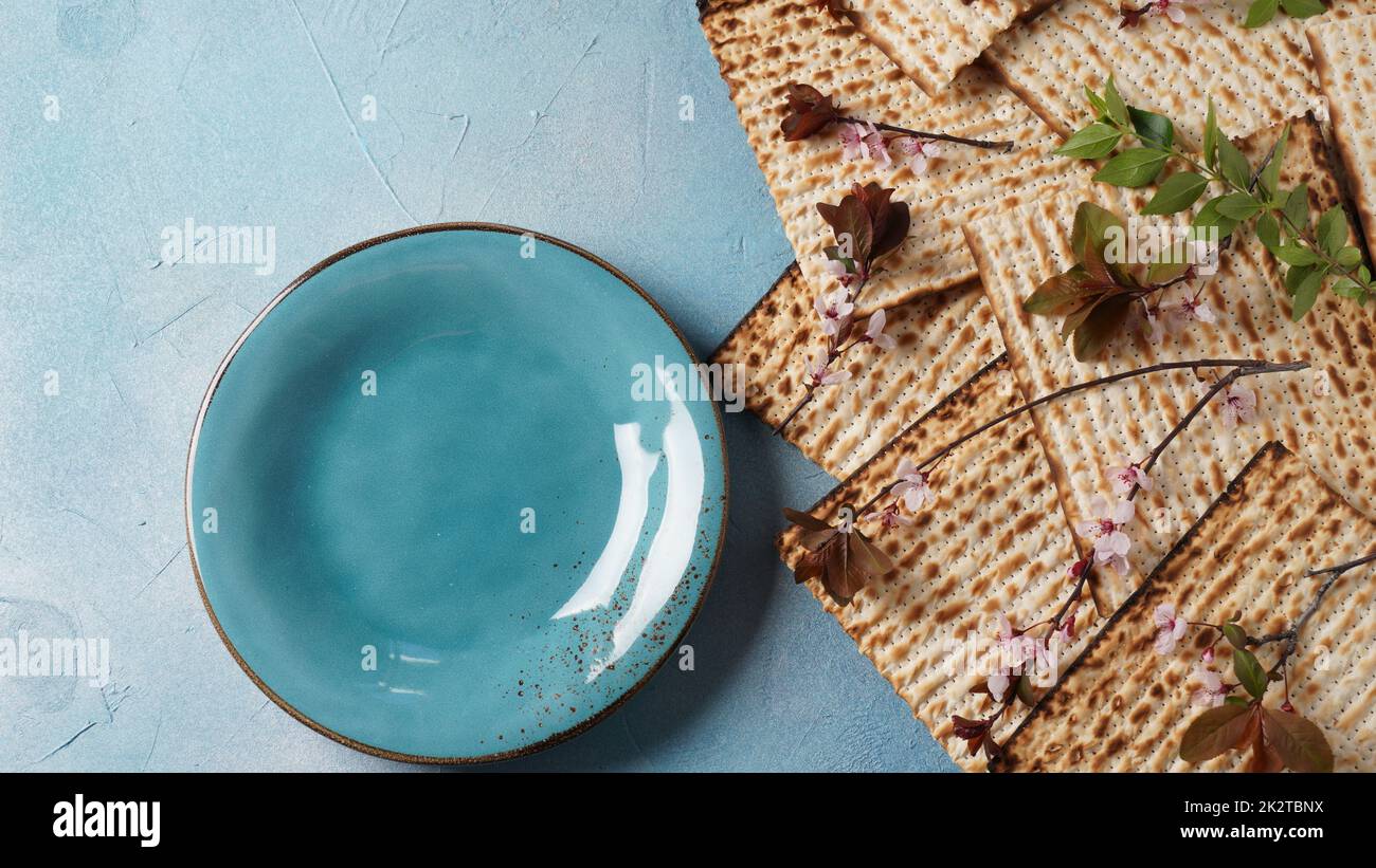 Table served for Passover (Pesach) indoors, with matzah bread as ...