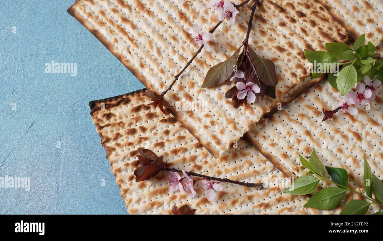 Table served for Passover (Pesach) indoors, with matzah bread as ...