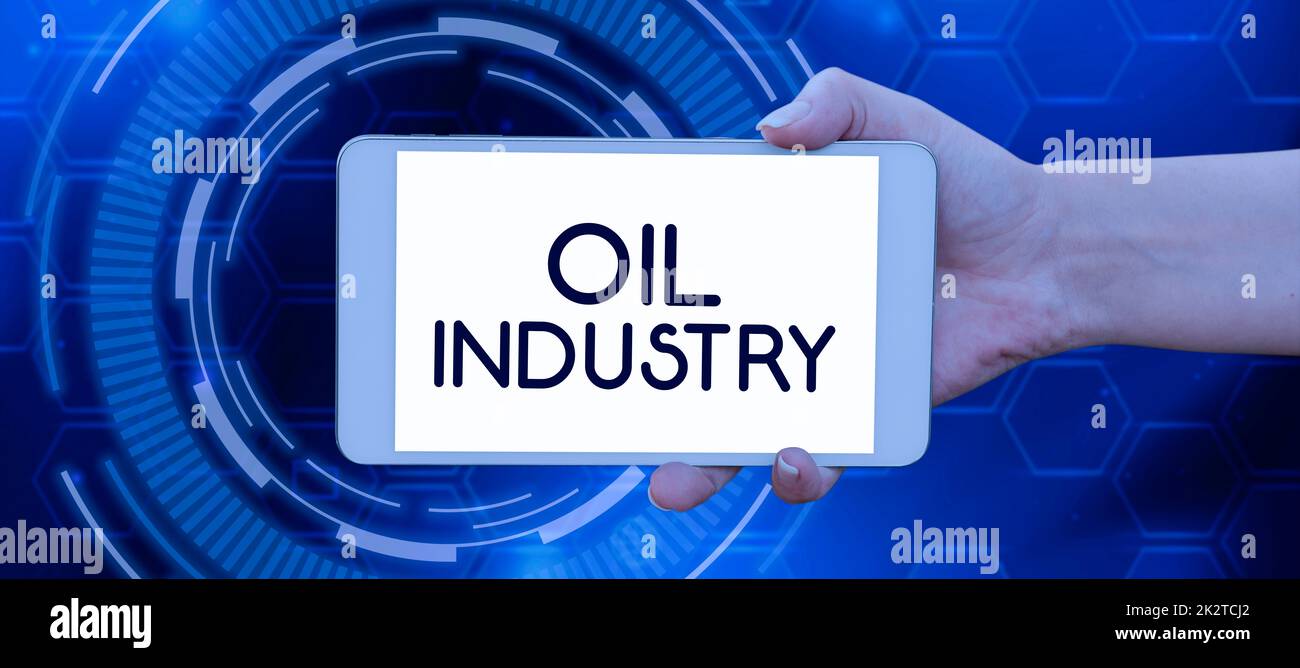 Hand writing sign Oil Industry. Word for Exploration Extraction ...
