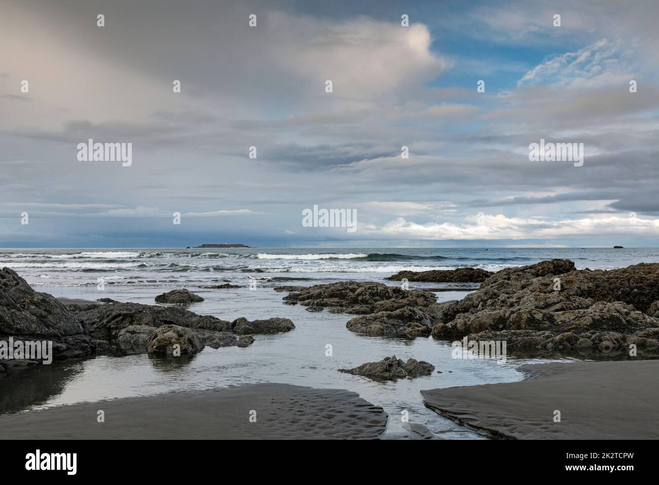WA22067-00...WASHINGTON - Tidal exposed rocks on a sandy Ruby Beach in ...