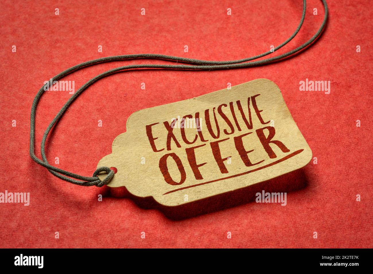 exclusive offer - sign on a price tag Stock Photo - Alamy