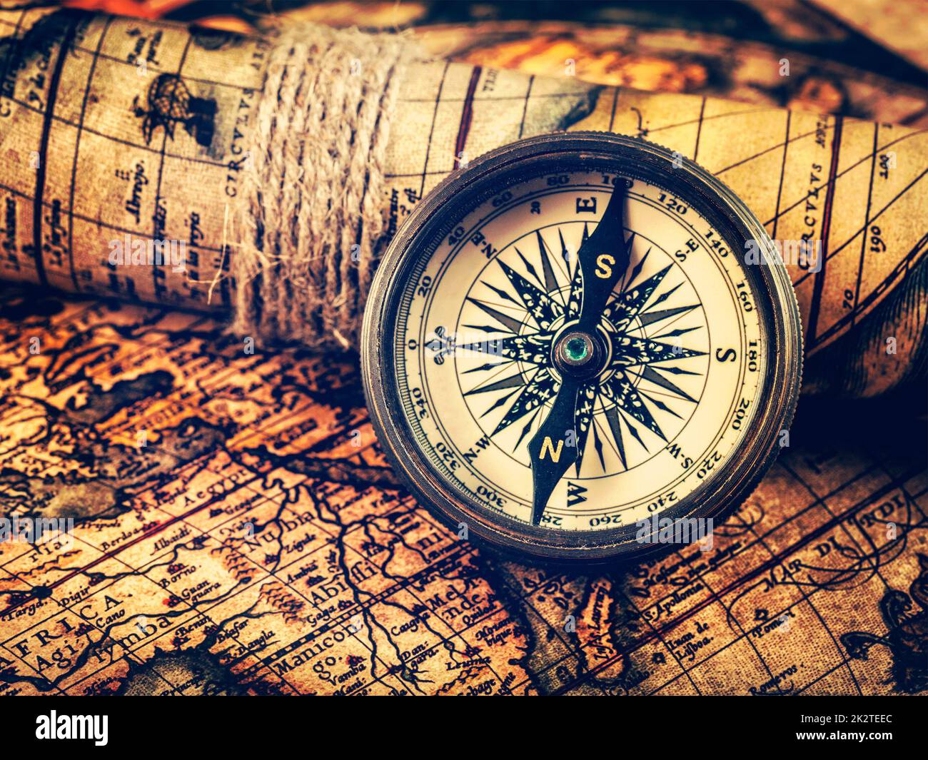 Old vintage compass on ancient map Stock Photo - Alamy