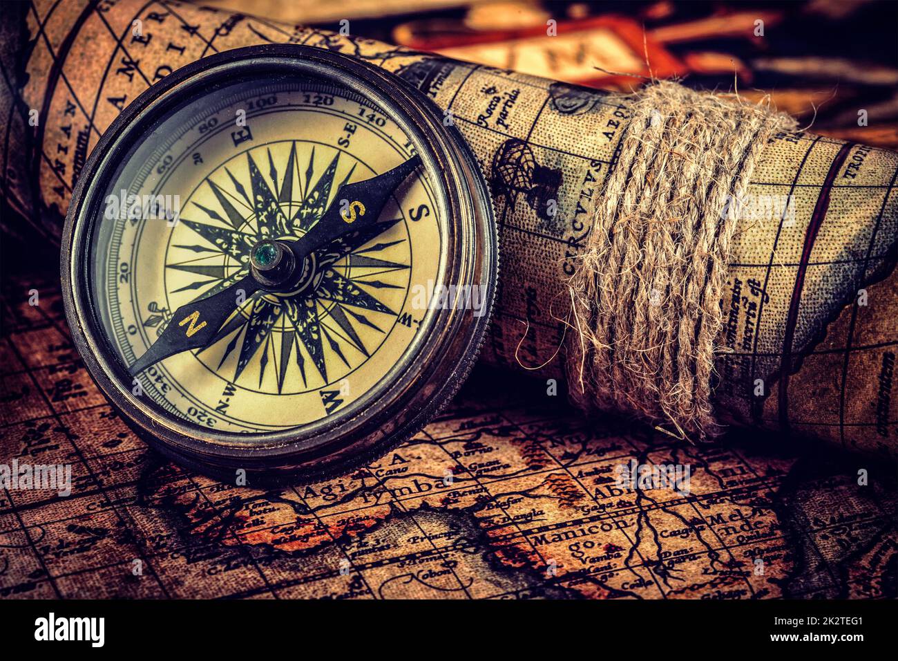 Old vintage compass on ancient map Stock Photo - Alamy