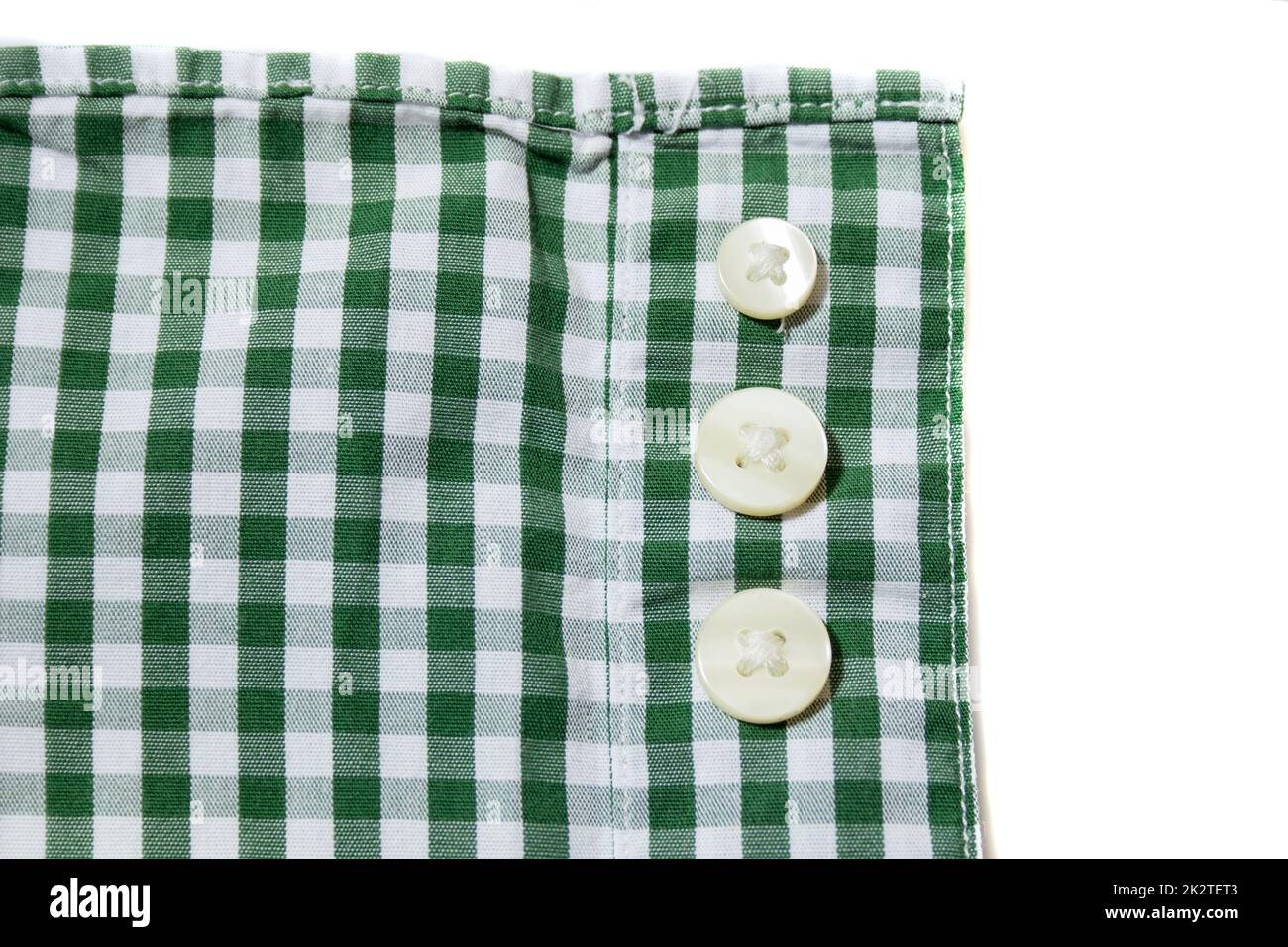 Three white spare buttons Stock Photo - Alamy