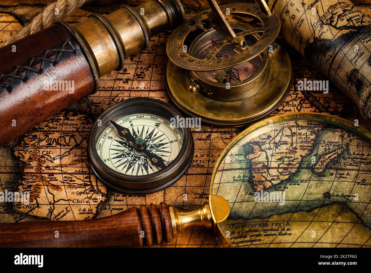 Old vintage compass and travel instruments on ancient map Stock Photo - Alamy