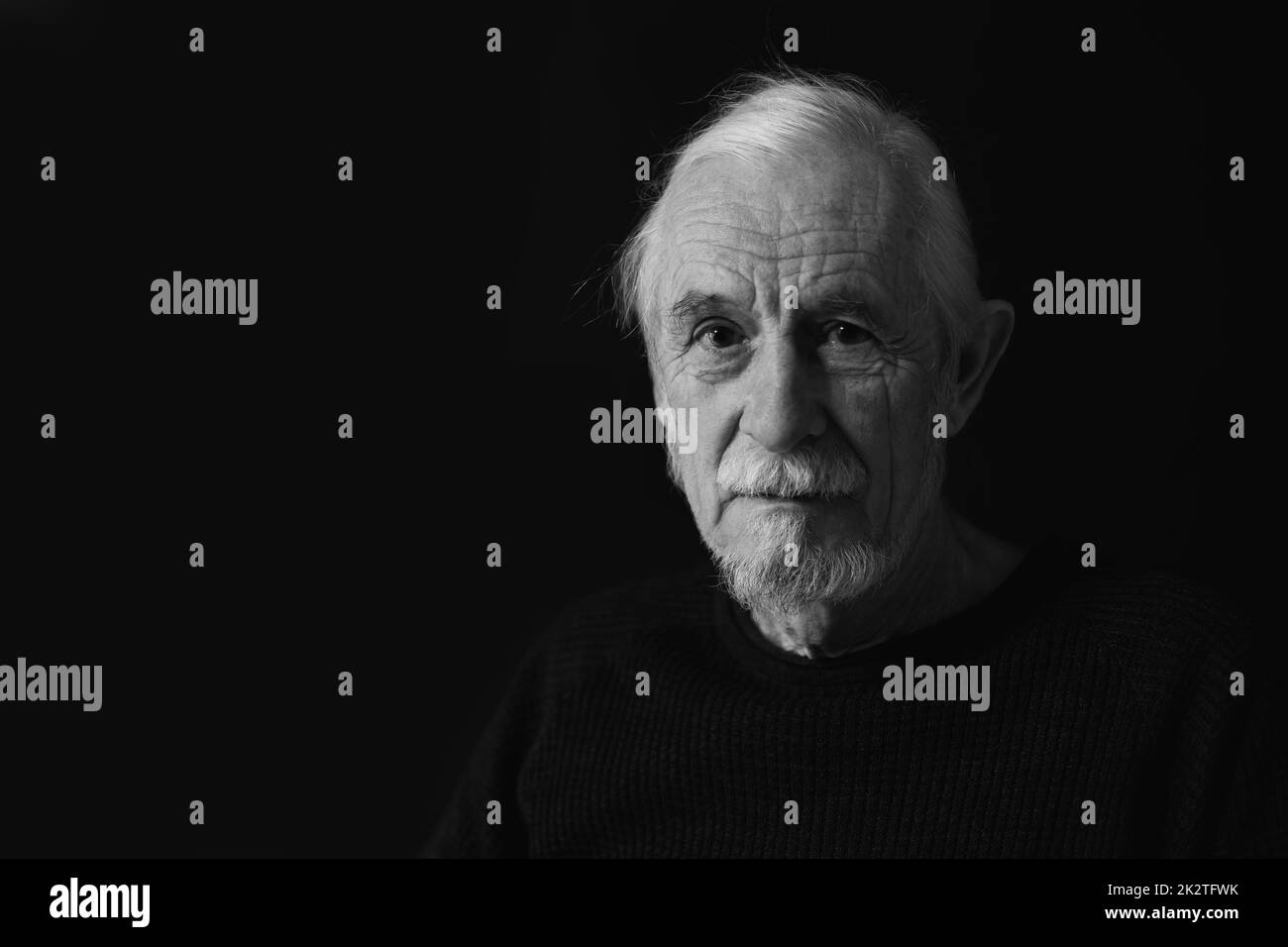 Low key black and white portrait of old man Stock Photo - Alamy