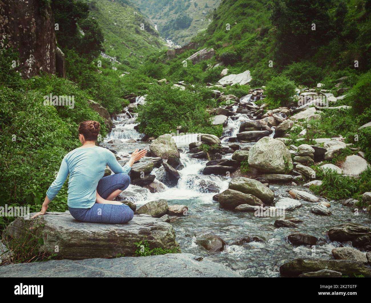 Woman doing Ashtanga Vinyasa Yoga asana Marichyasana D Stock Photo - Alamy