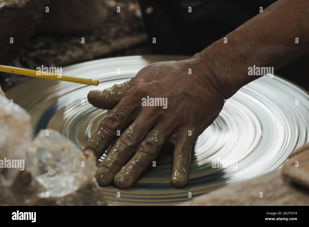 Making pottery by hand to make a container Stock Photo - Alamy