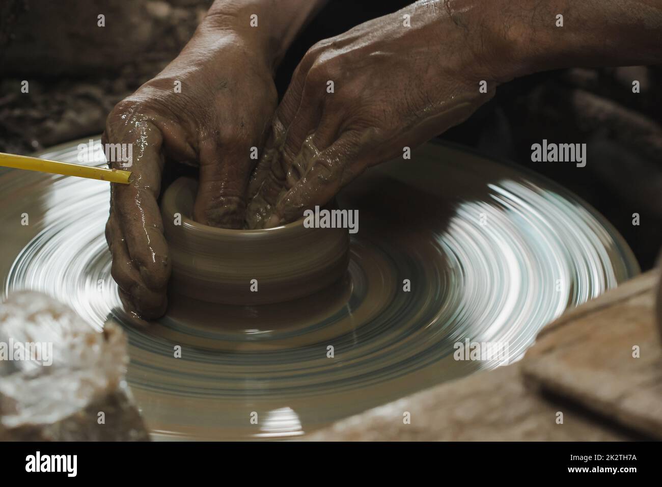 Making pottery by hand to make a container Stock Photo - Alamy