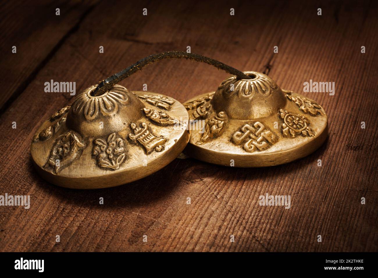 Tibetan Buddhist tingsha cymbals Stock Photo - Alamy