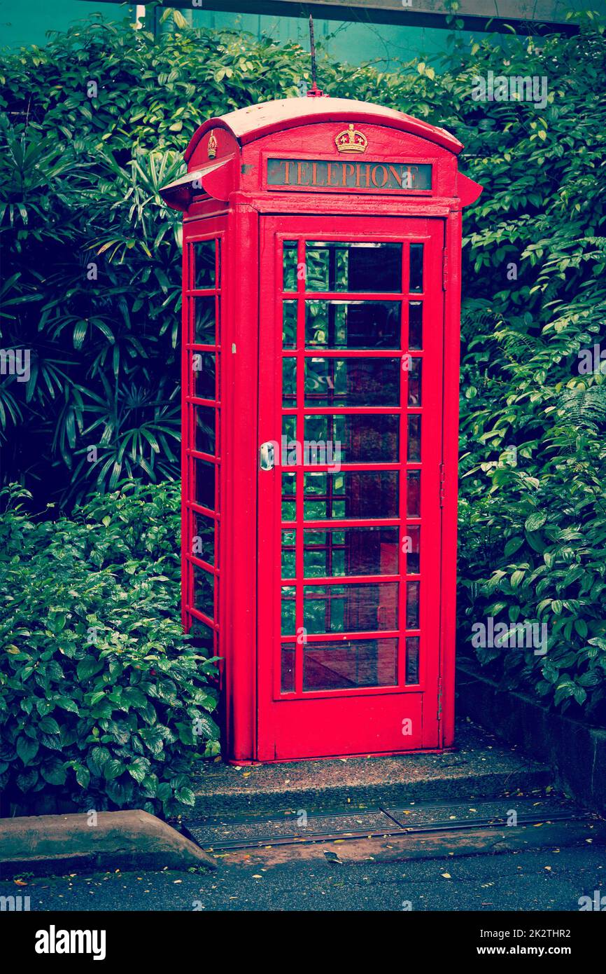 Red English telephone booth Stock Photo - Alamy