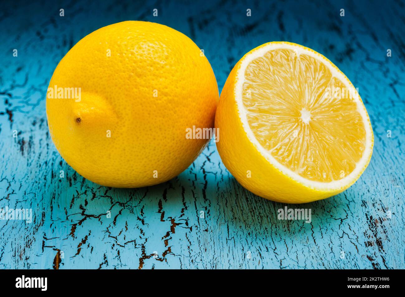 Lemon and cut half slice Stock Photo - Alamy