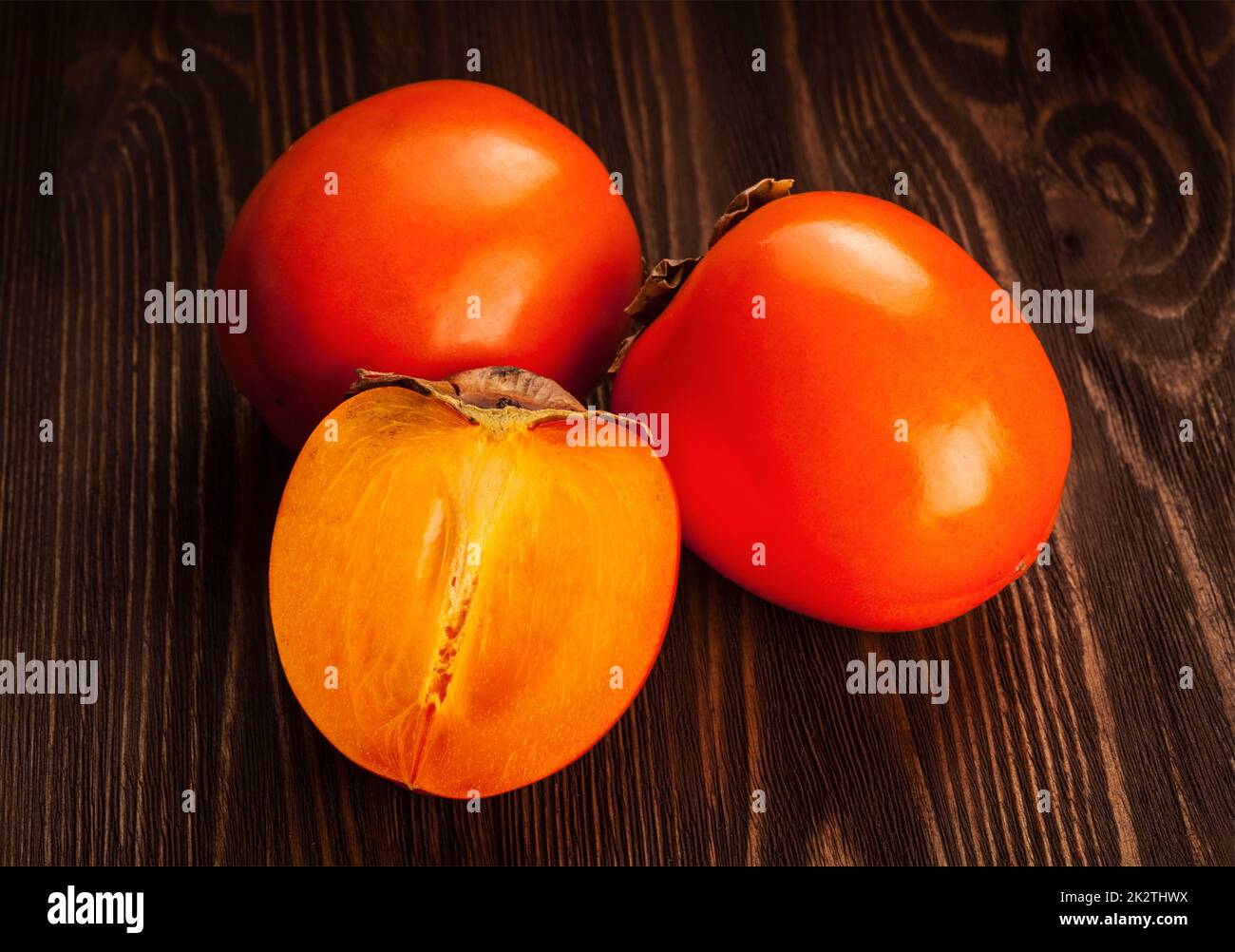 Sliced sweet persimmon kaki hi-res stock photography and images - Alamy