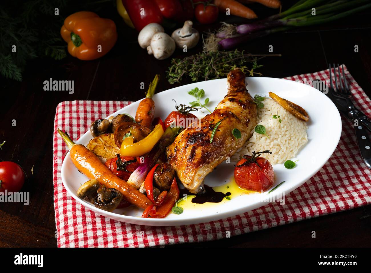 Rustic fried chicken legs with assorted vegetables and rice Stock Photo ...