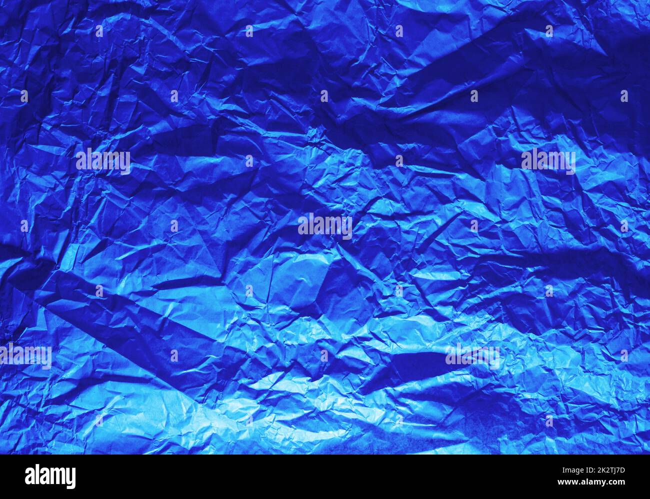 Texture of blue crumpled paper, background for the inscription. Blank ...