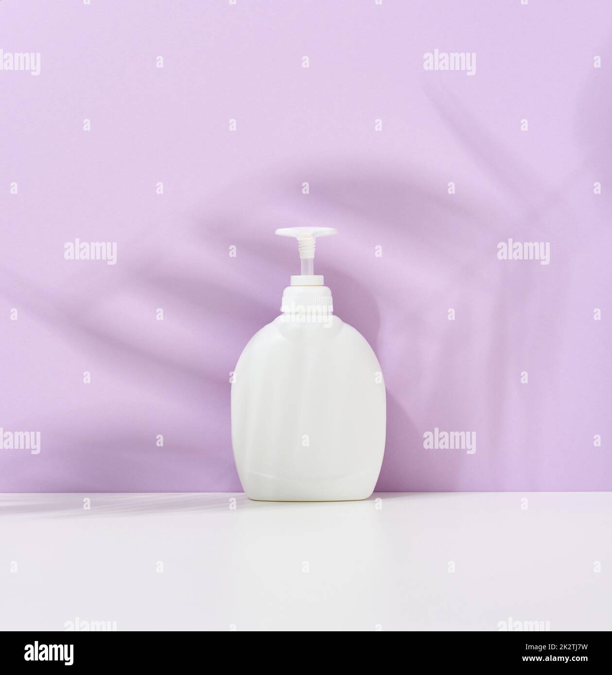 White plastic container with a pump for cosmetic liquid Stock Photo - Alamy