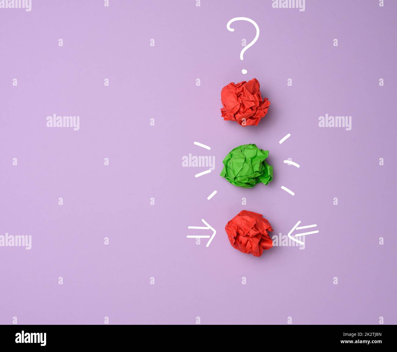 Crumpled balls of paper on a purple background, the concept of finding ...