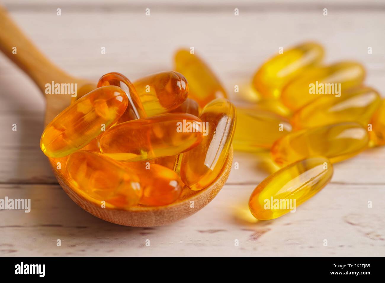 Fish oil or Cod liver oil gel in capsules with omega 3 vitamins ...