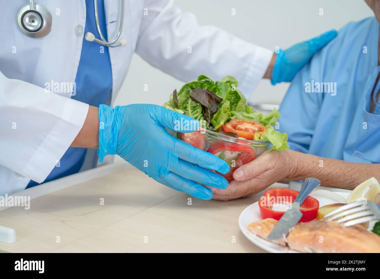Asian senior or elderly old lady woman patient eating breakfast ...