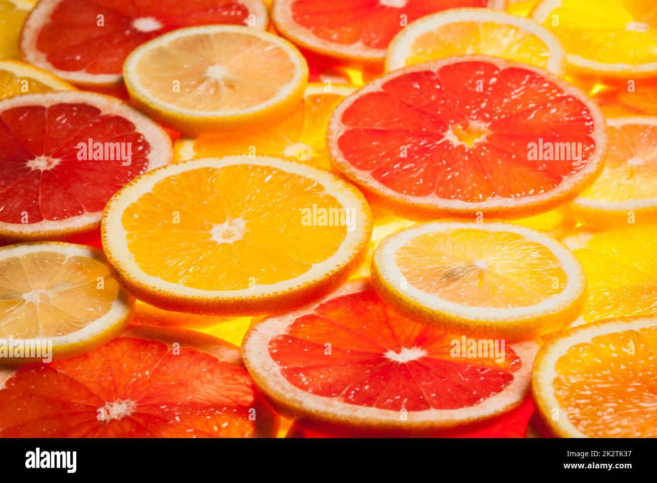 Colorful citrus fruit slices Stock Photo - Alamy