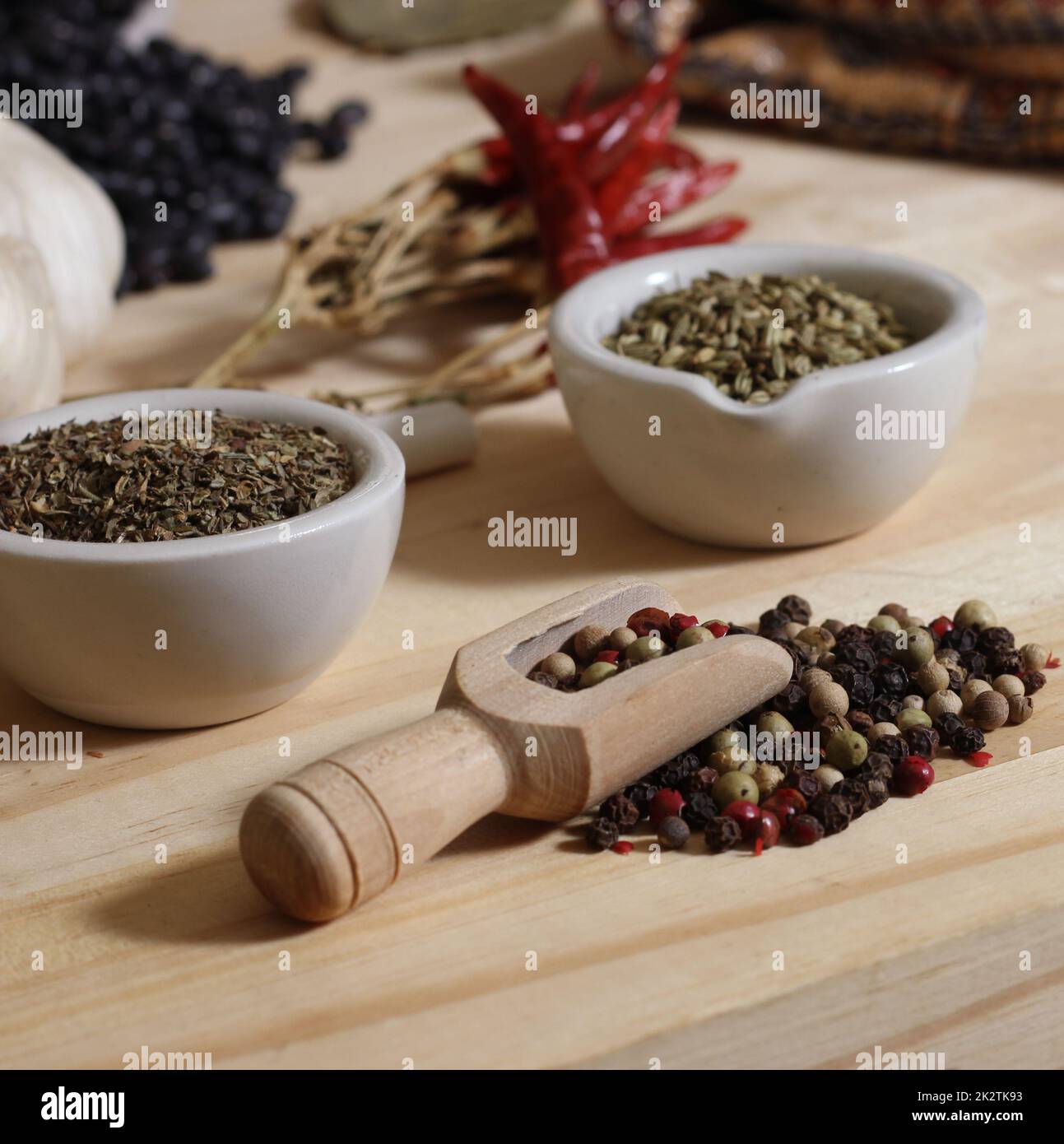 Herbs and Spices on Rustic Table With Black Beans in Background Stock ...