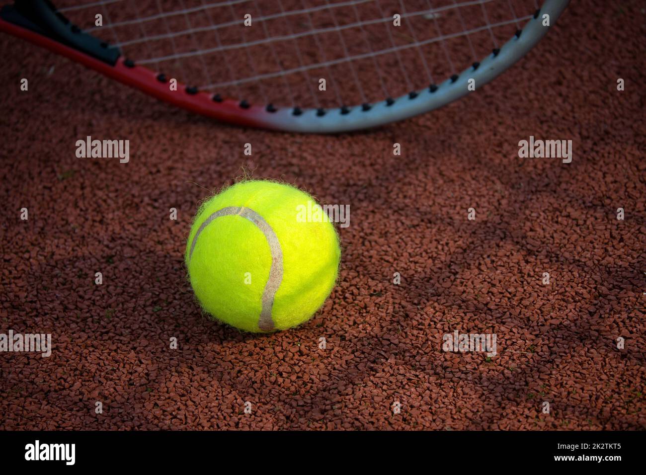 Shadow of net and racket surrounding a tennis ball Stock Photo - Alamy