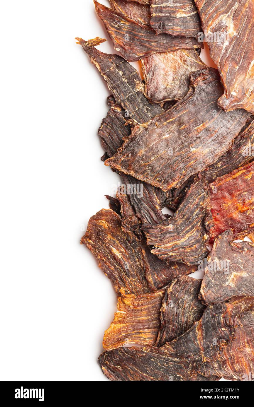 Beef jerky meat. Dried sliced meat isolated on white background Stock ...