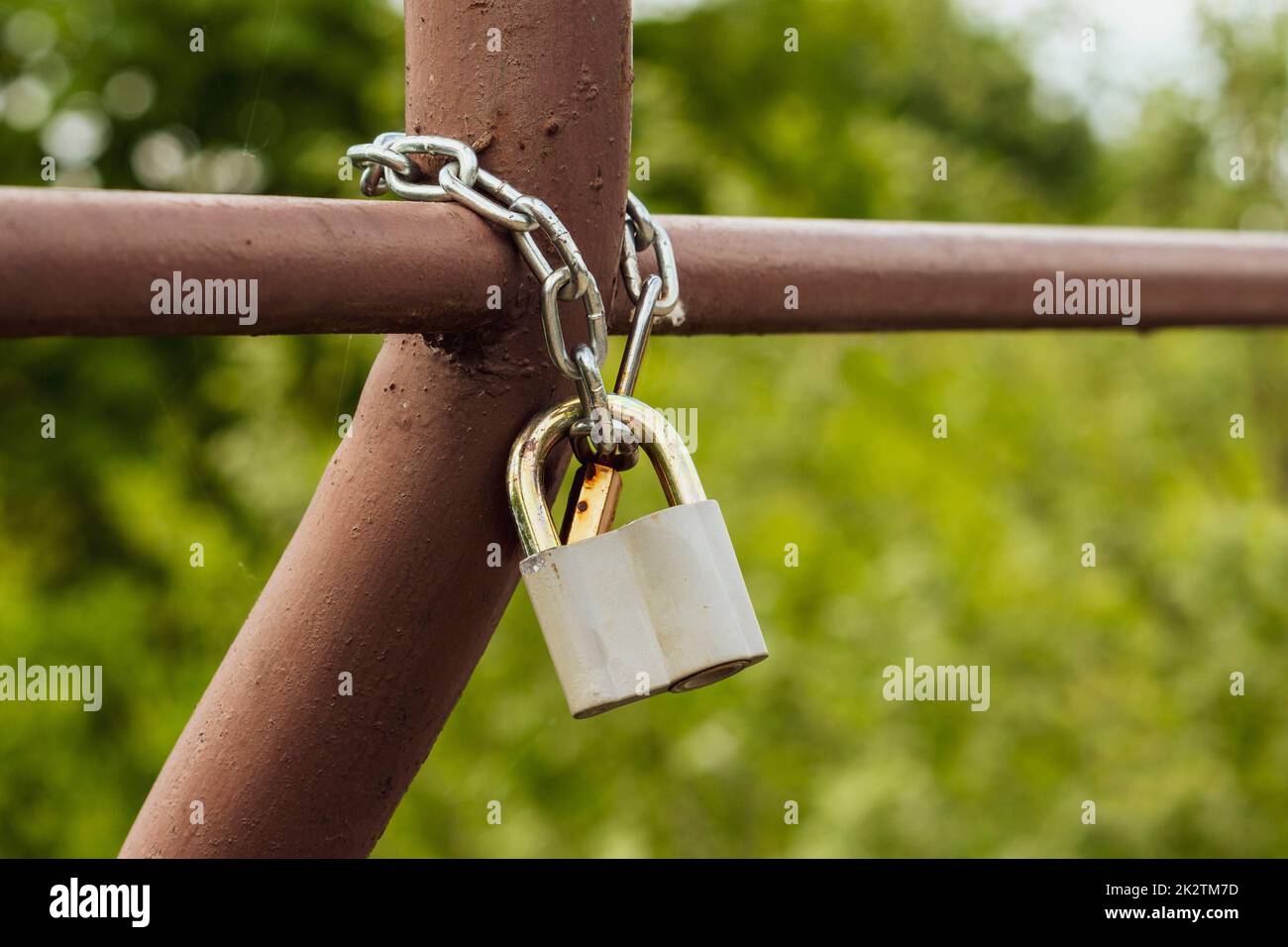 Bride and groom padlock hanging on a bridge Stock Photo - Alamy