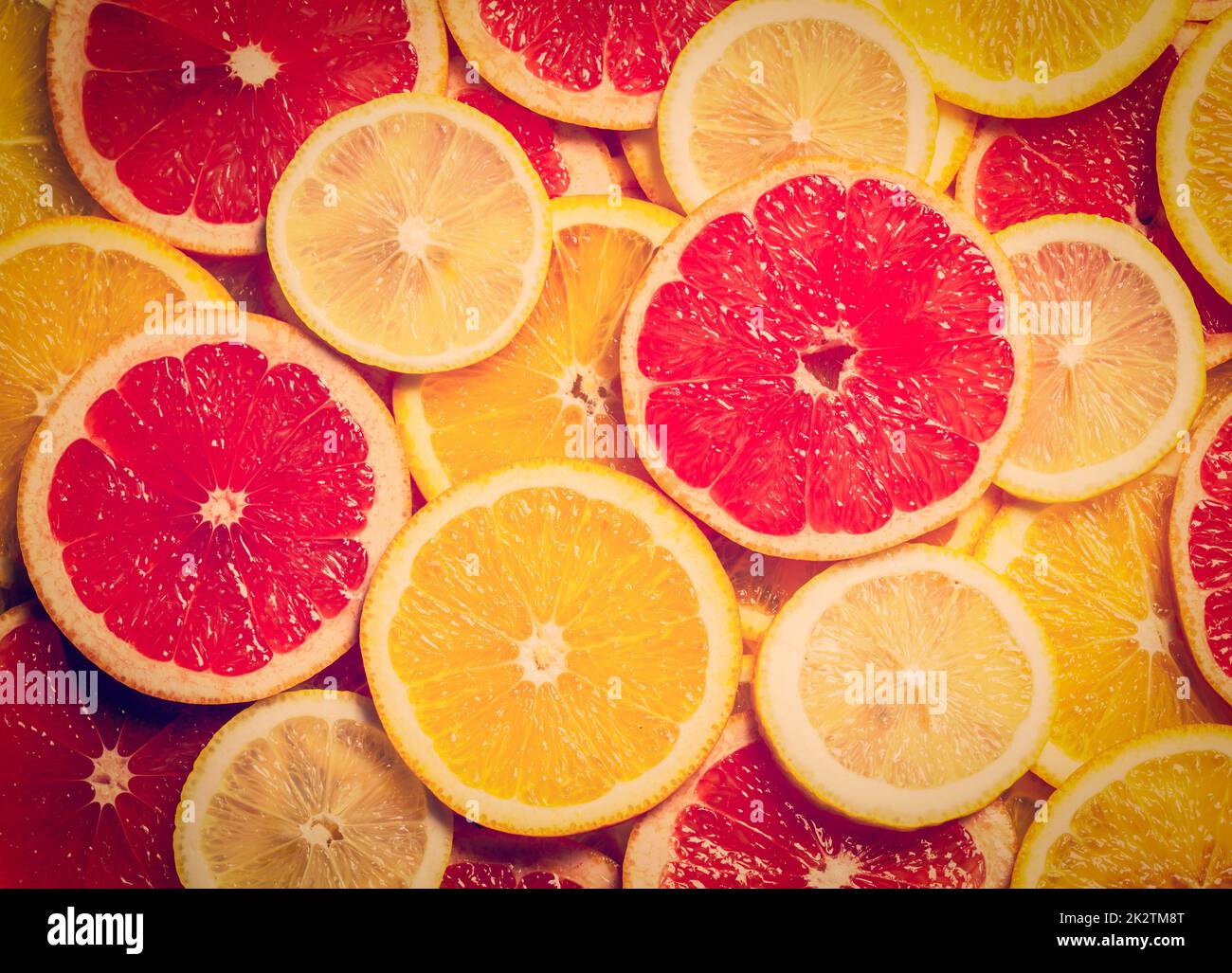 Colorful citrus fruit slices Stock Photo - Alamy