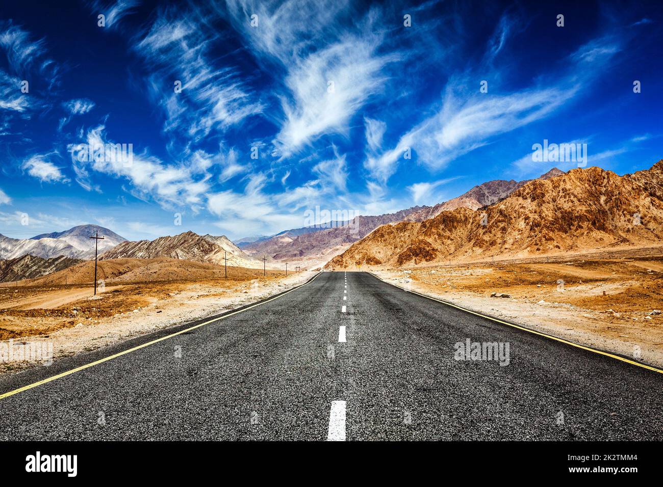 Road in Himalayas with mountains Stock Photo - Alamy