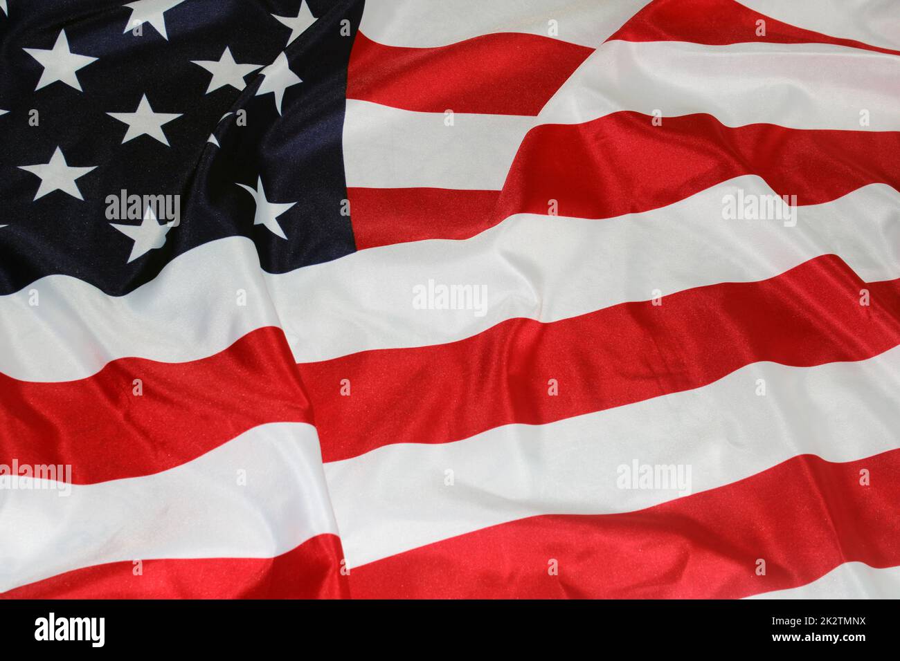 The flag of the United States, folded in waves. Flag Day. The concept ...