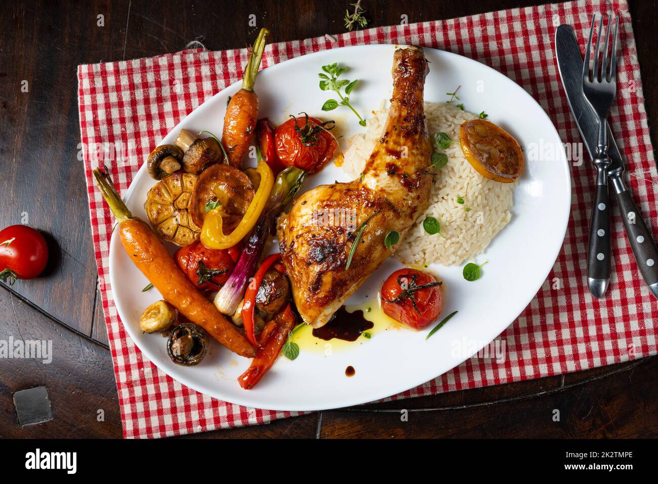 Rustic fried chicken legs with assorted vegetables and rice Stock Photo ...