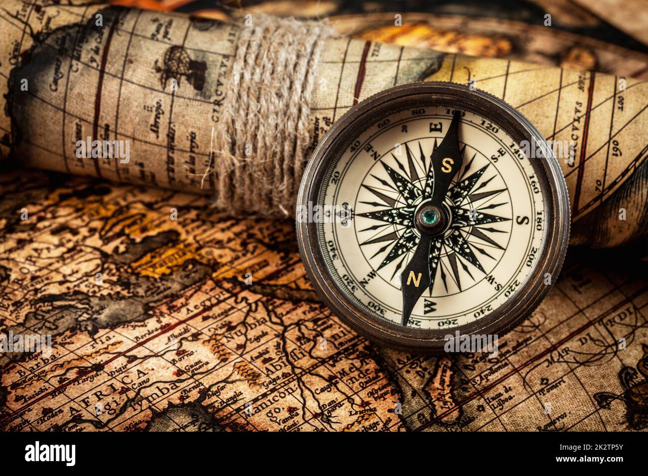 Old vintage compass on ancient map Stock Photo - Alamy
